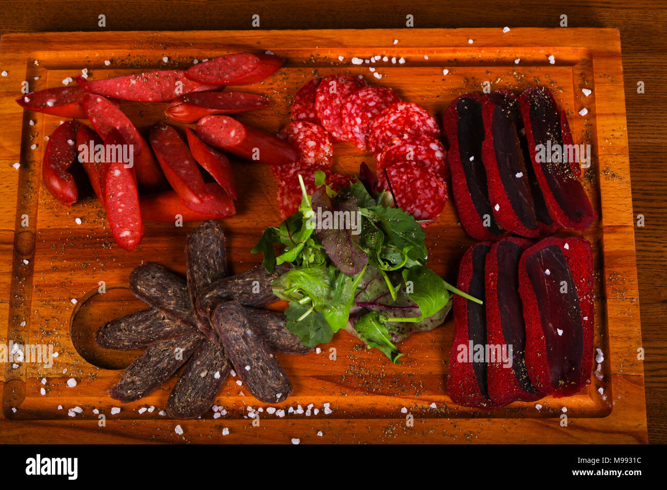 Sausages plate mix snack Stock Photo - Alamy