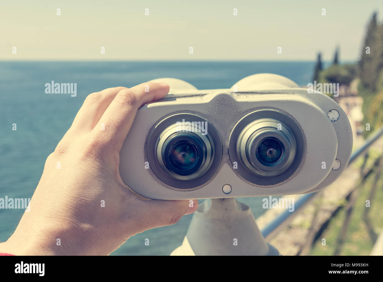 Coin operated binoculars with seaview Stock Photo - Alamy