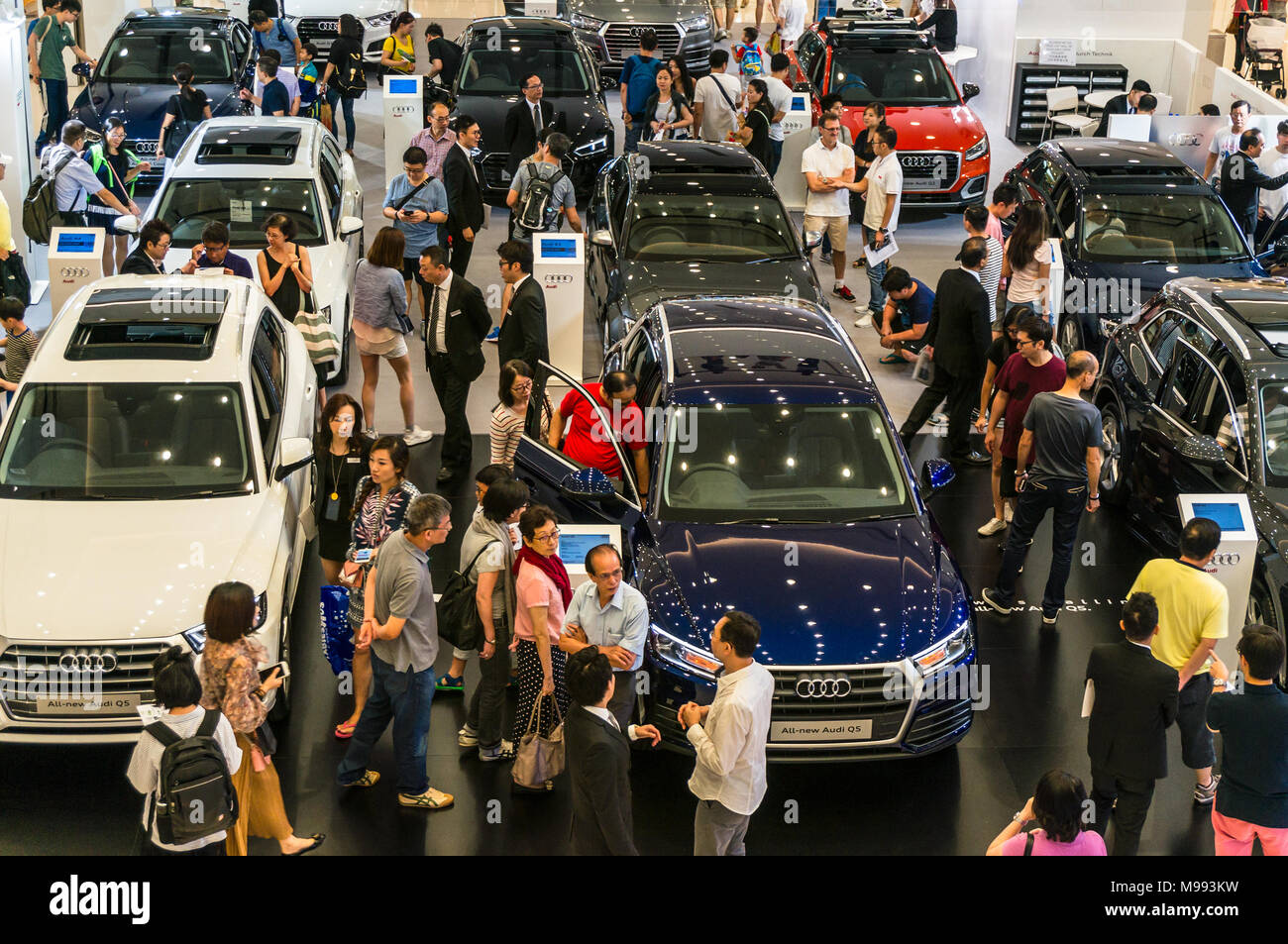 Busy Audi showroom in Hong Kong, with people Stock Photo - Alamy