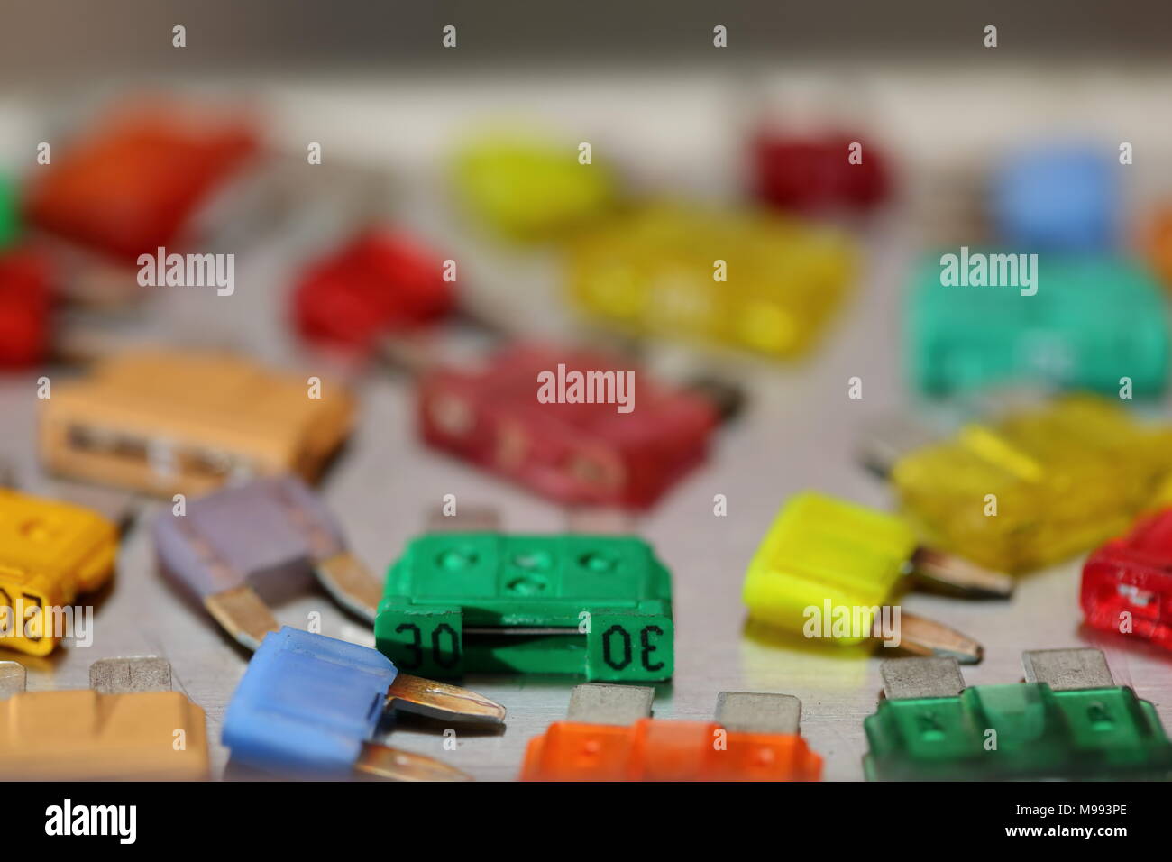 Automotive fuses come in different colors and each color is responsible ...