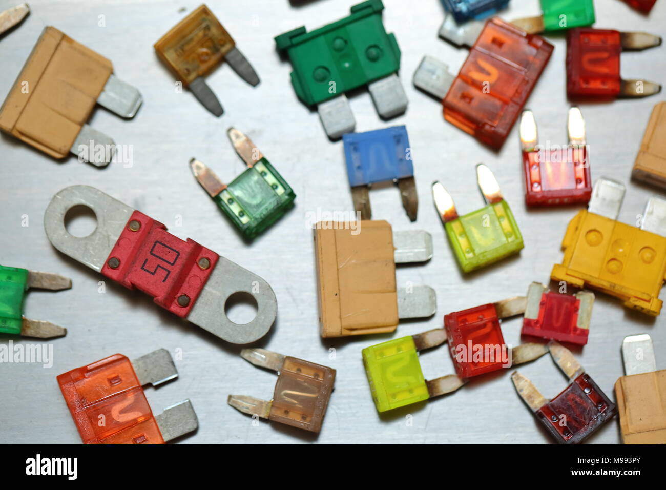Automotive fuses come in different colors and each color is responsible ...