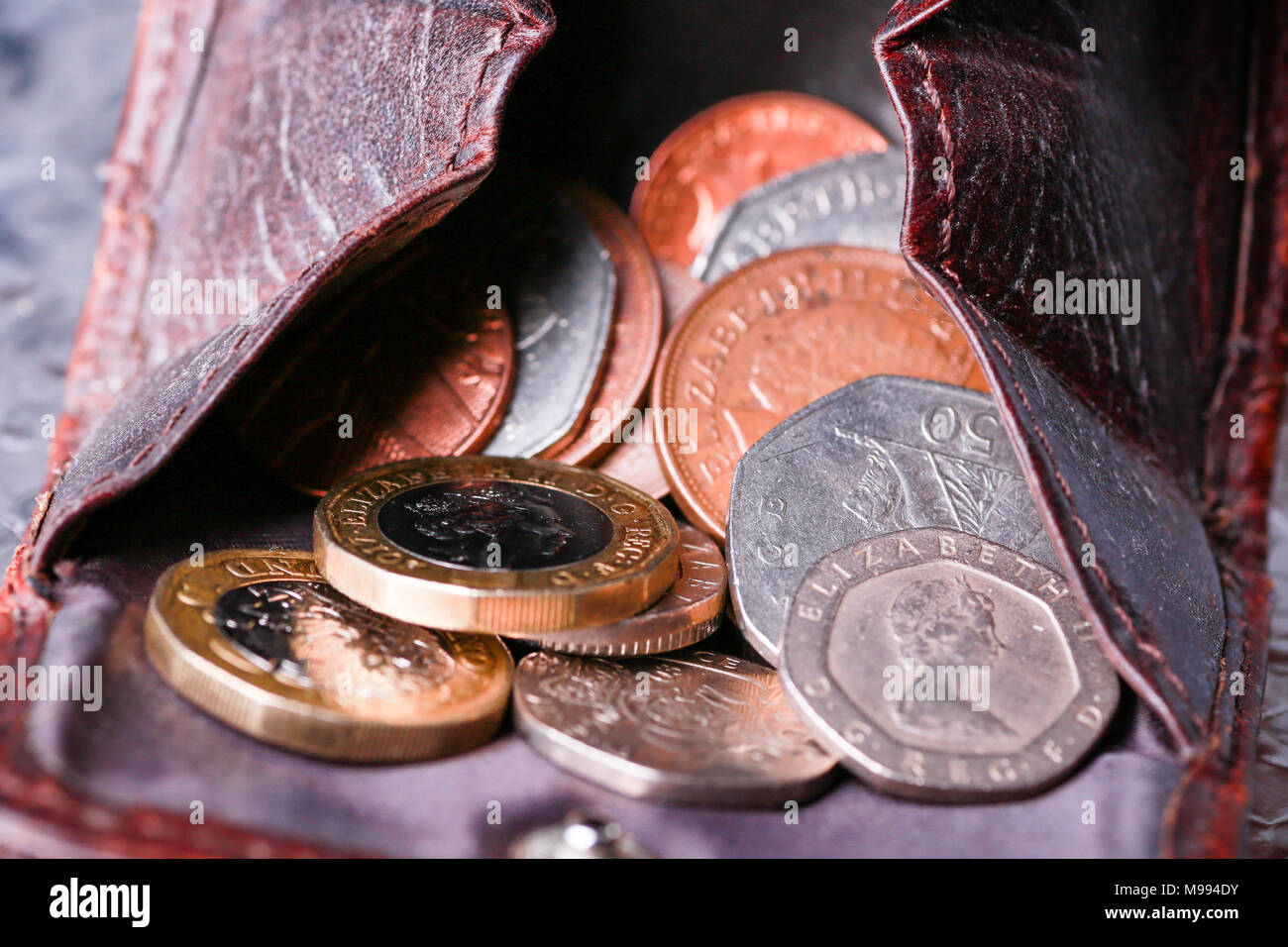 Euro coins in leather pouch hi-res stock photography and images - Alamy