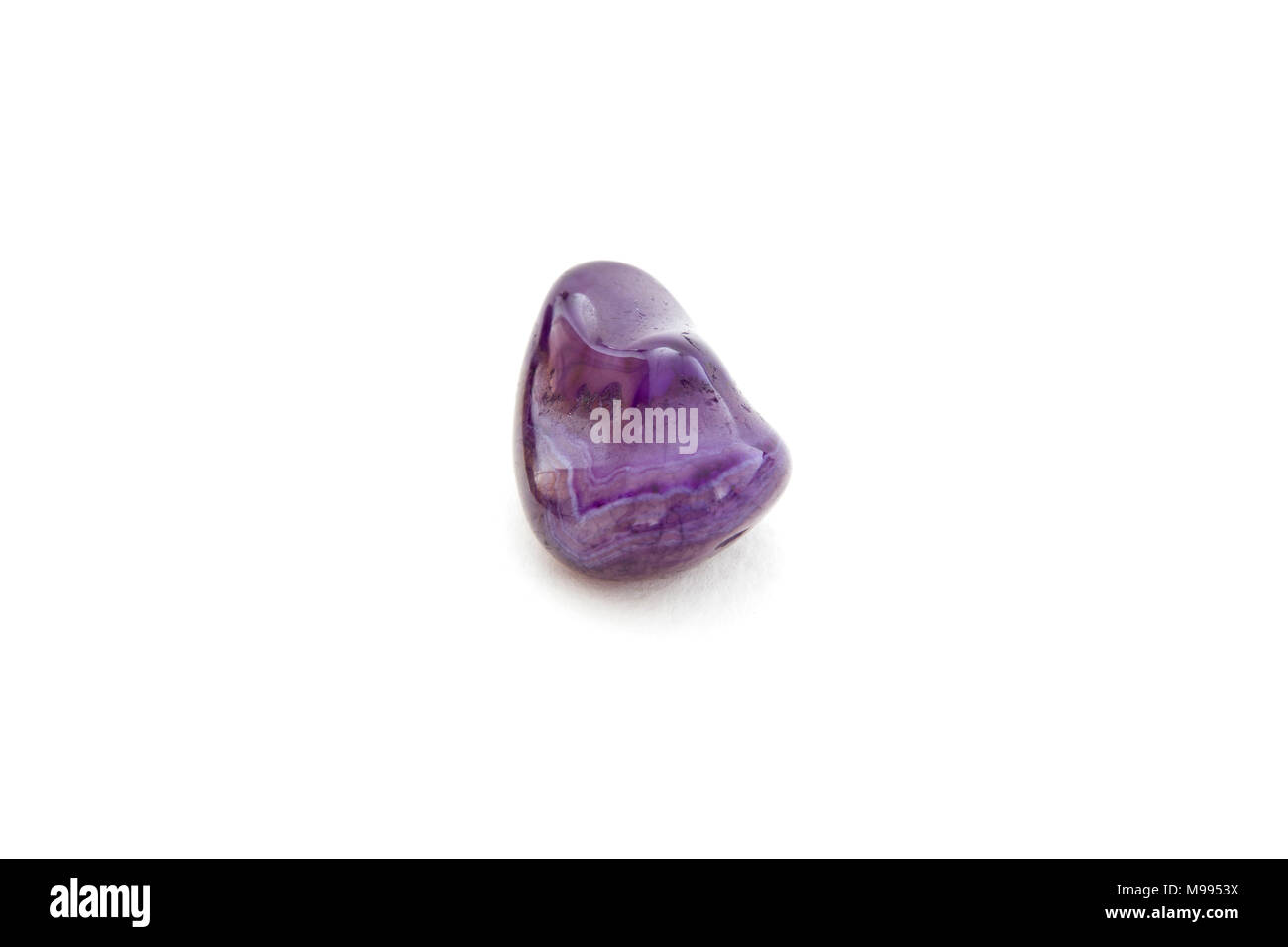 Single amethyst mineral on the white background Stock Photo - Alamy