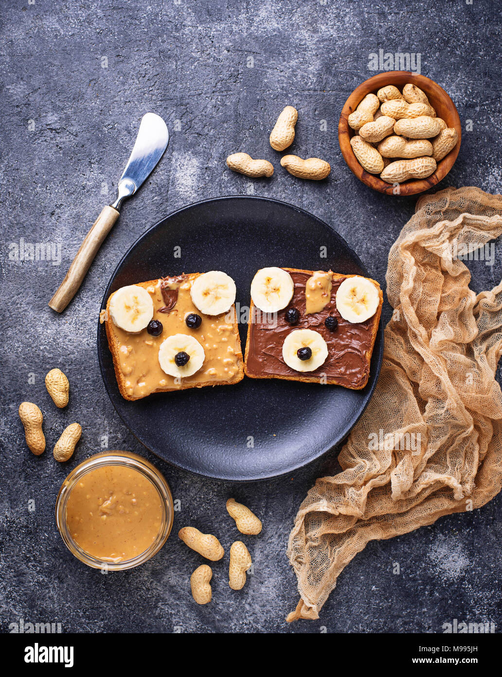 Sandwiches with peanut butter in shape of bear Stock Photo - Alamy