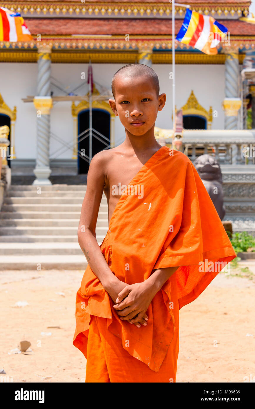 Young buddhist monk standing outside hi-res stock photography and ...
