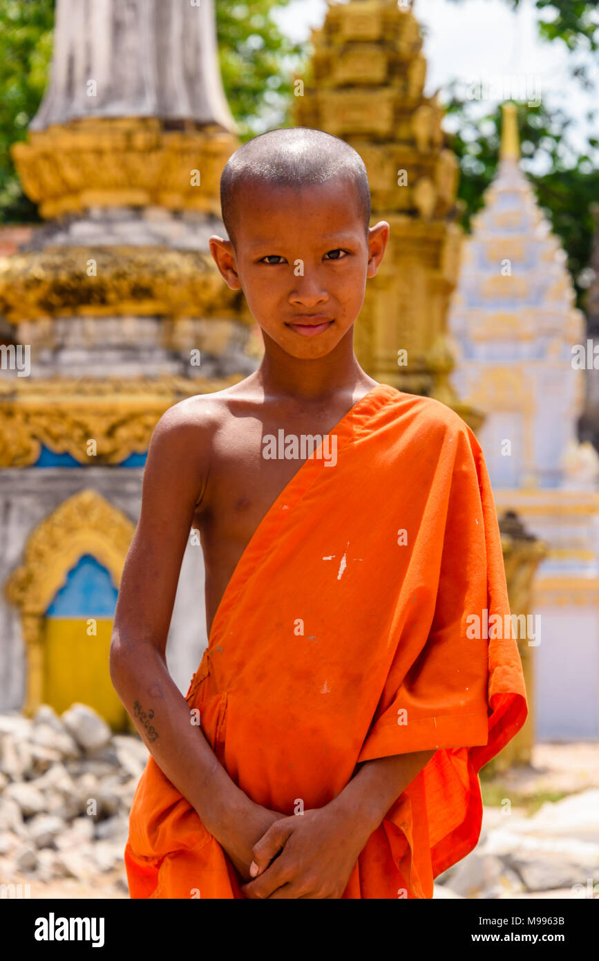 Young buddhist monk standing outside hi-res stock photography and ...