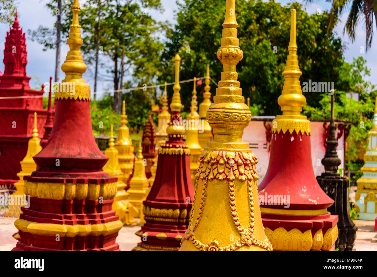 Stupa, traditional Buddhist burial gravestones at a temple in a rural ...