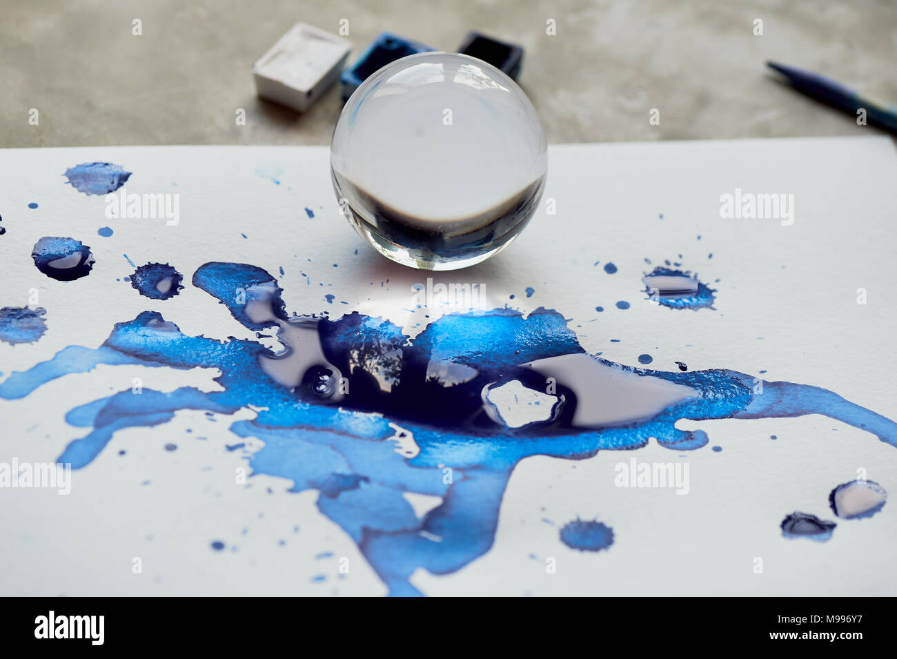 glass bowl and reflection in blue ink puddle.Abstraction Stock Photo ...