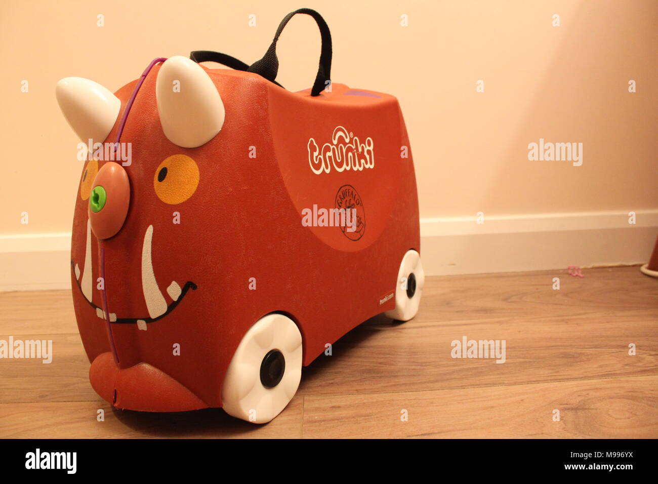 Trunki ride of suitcase Stock Photo - Alamy