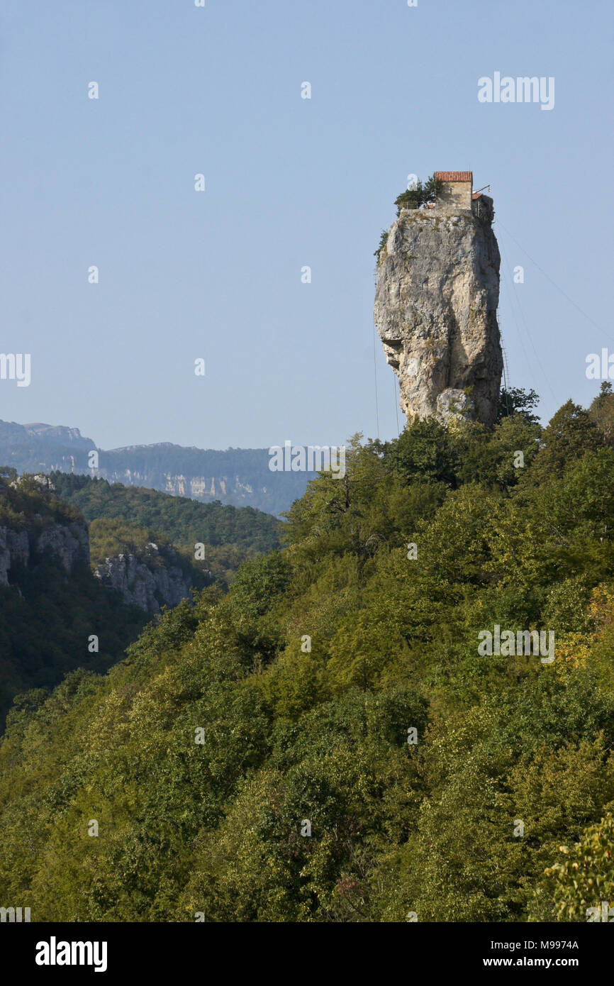 Katskhi Pillar, a limestone monolith with a small church on top ...