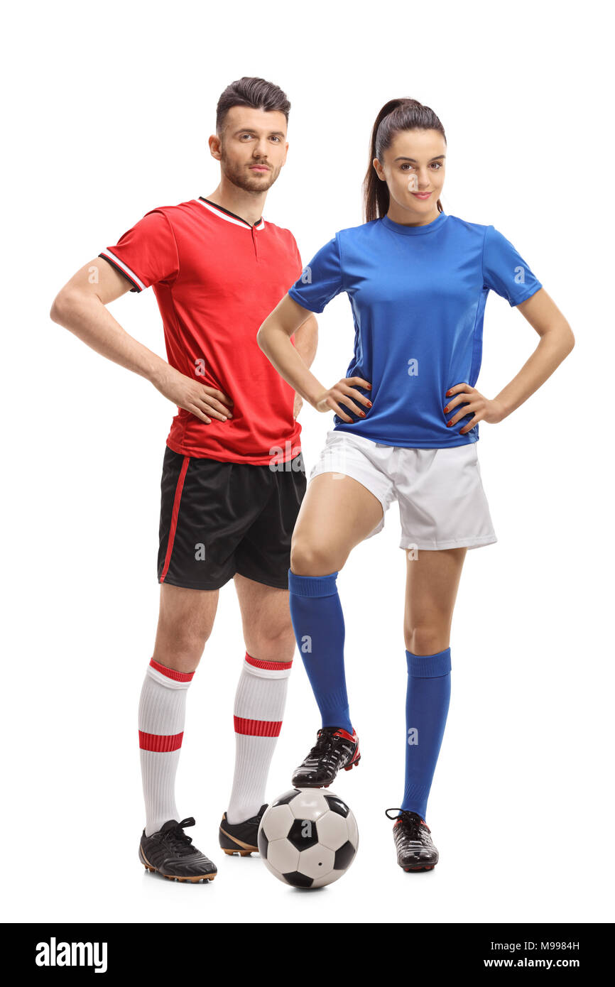 Full length portrait of a male and a female soccer player with a ...