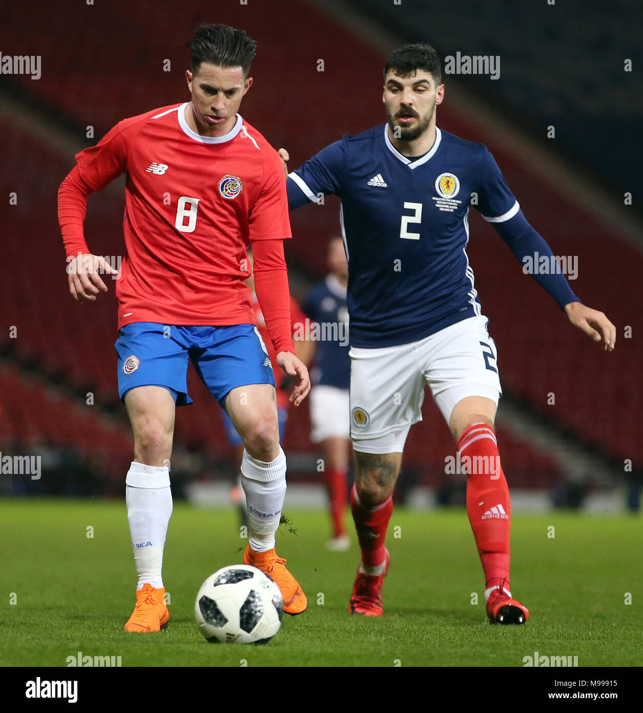 Scotland's Callum Paterson (right) and Costa Rica's Bryan Oviedo battle ...
