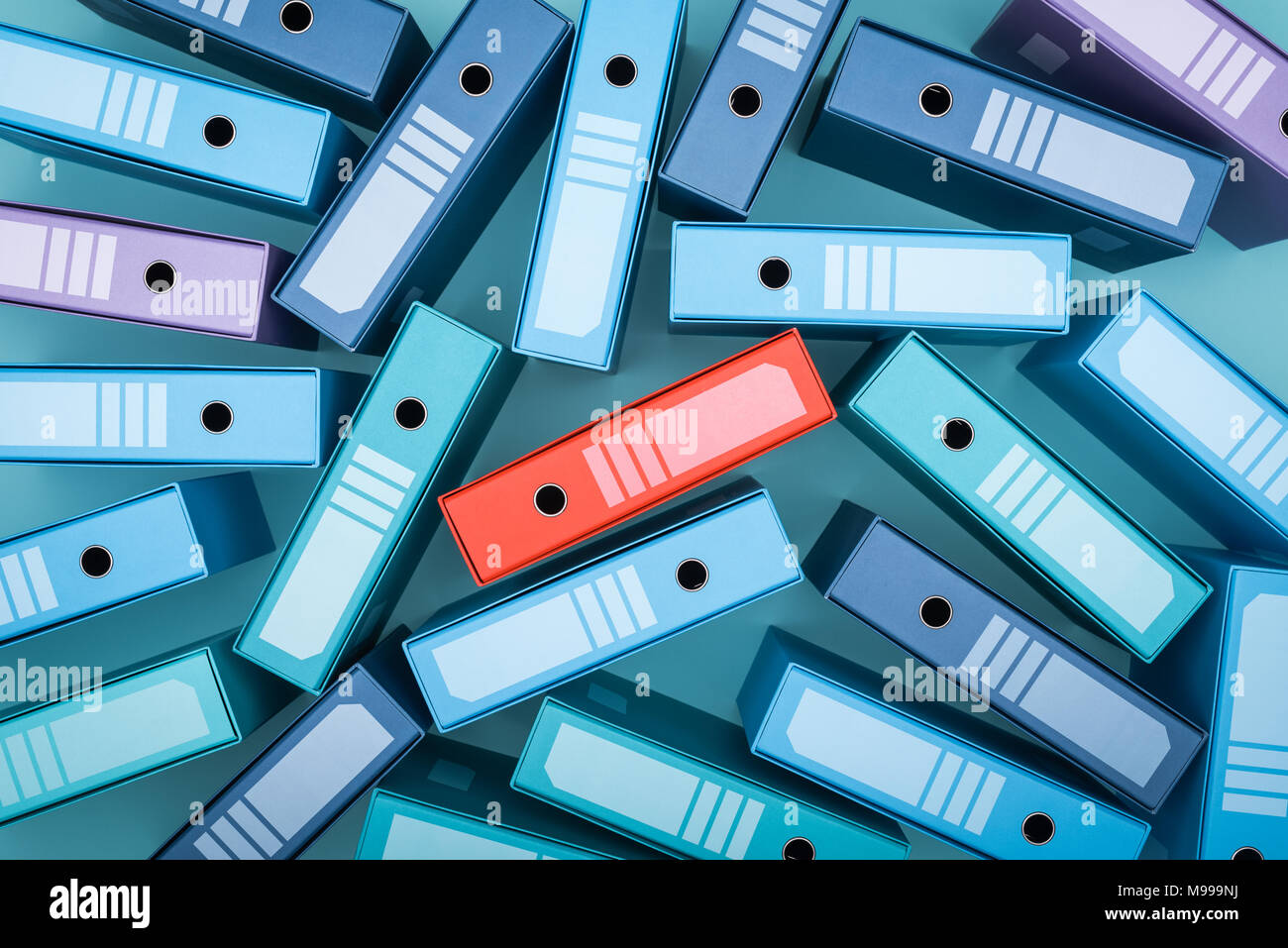 Finding a folder in a disorganized archive: highlighted ring binder in ...