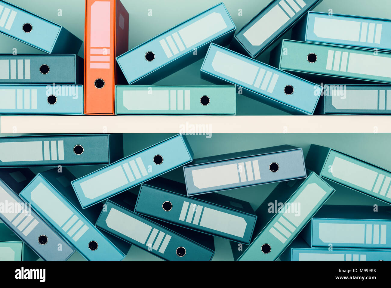 Finding a folder in a disorganized archive: highlighted ring binder in ...