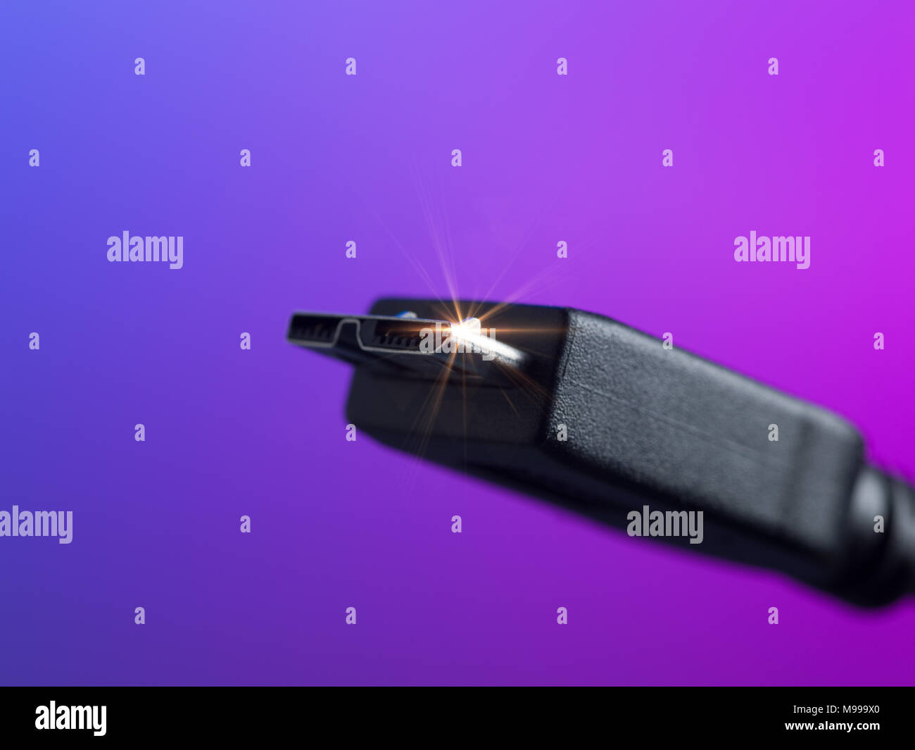 Usb cable plug close up on colorful background, electronics and ...