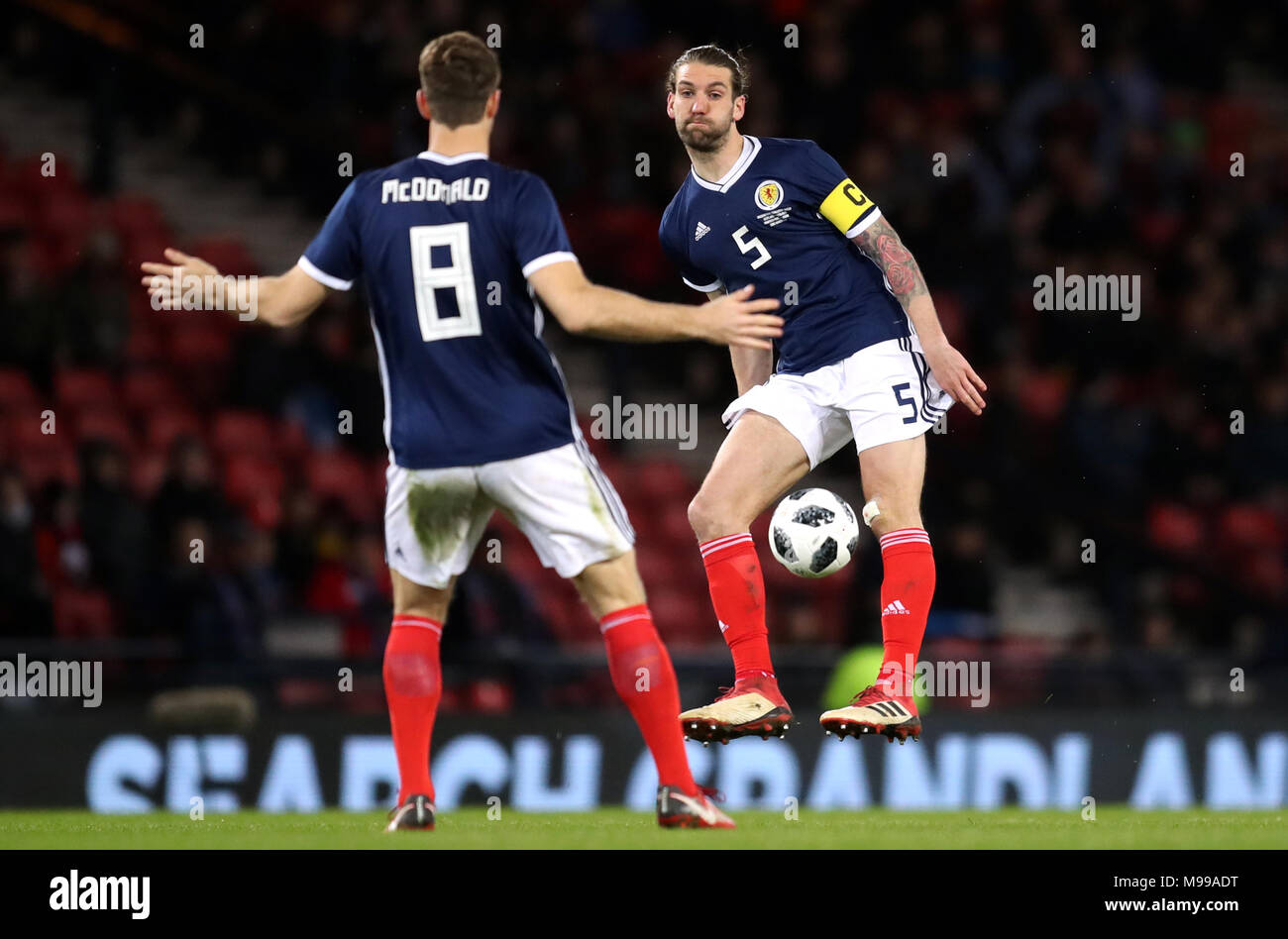 Scotland's Charlie Mulgrew (right) and Kevin McDonald during the ...