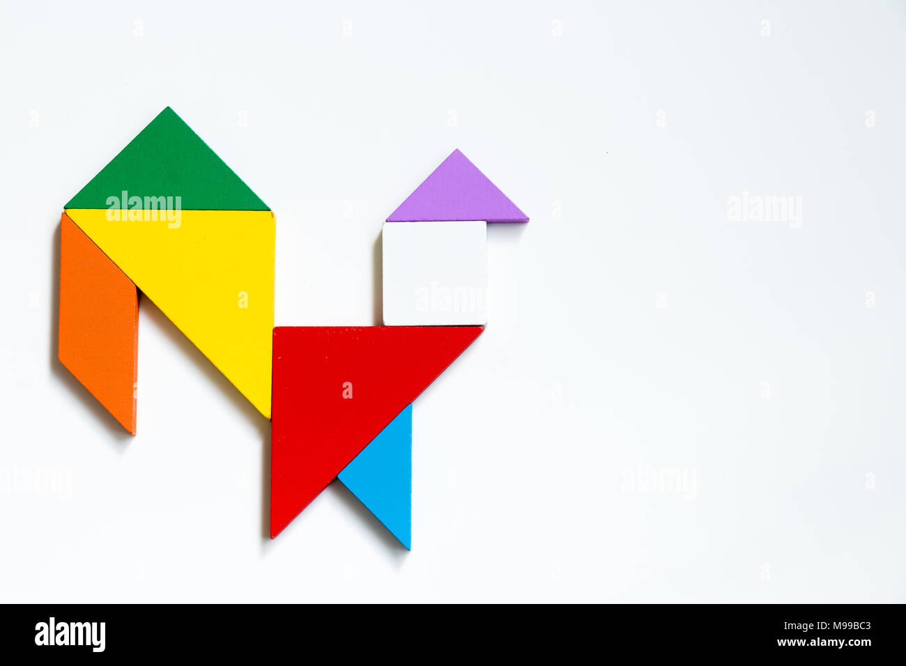 Colorful wood tangram puzzle in chicken shape on white background Stock ...