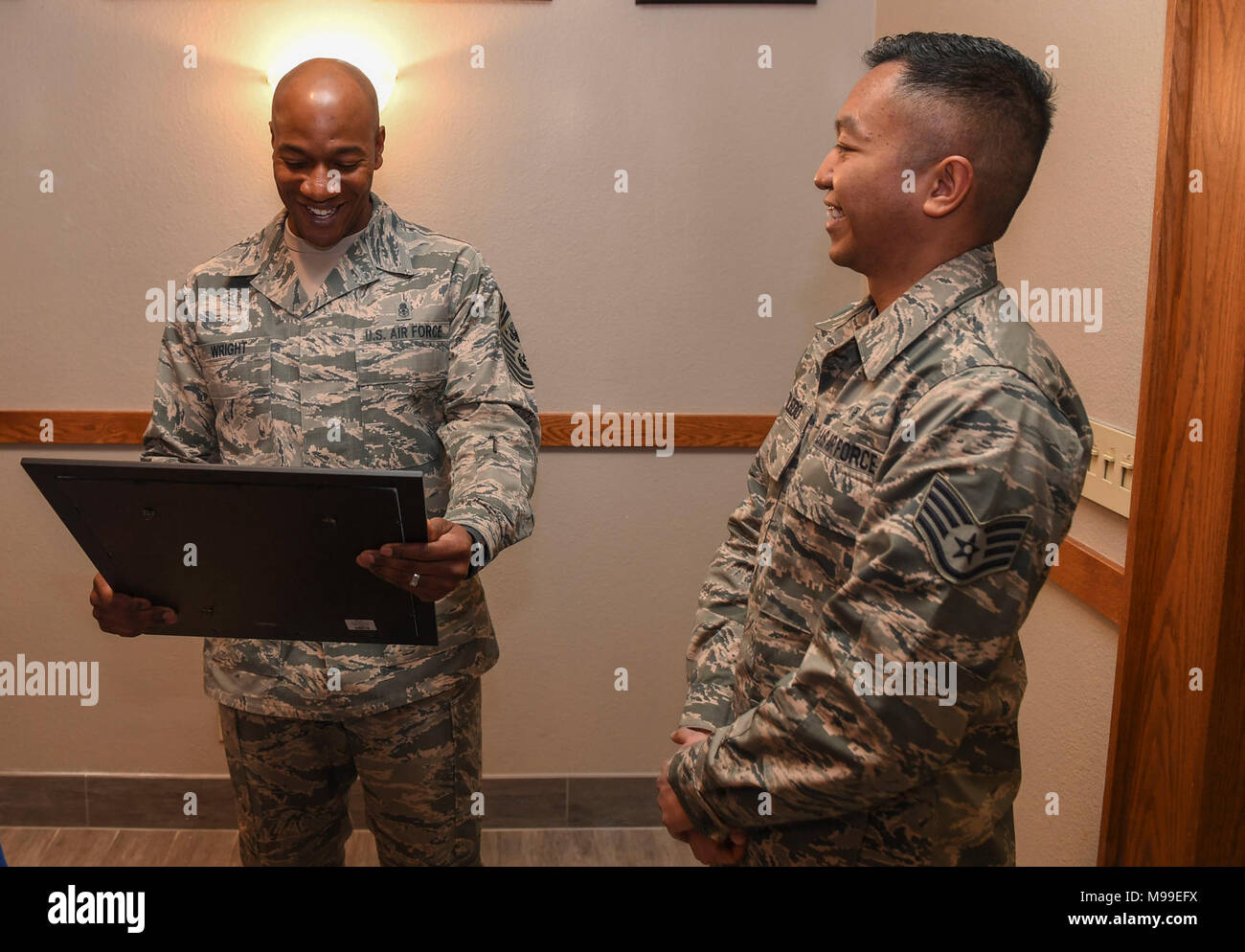 Chief Master Sgt. of the Air Force Kaleth O. Wright views a drawing of ...