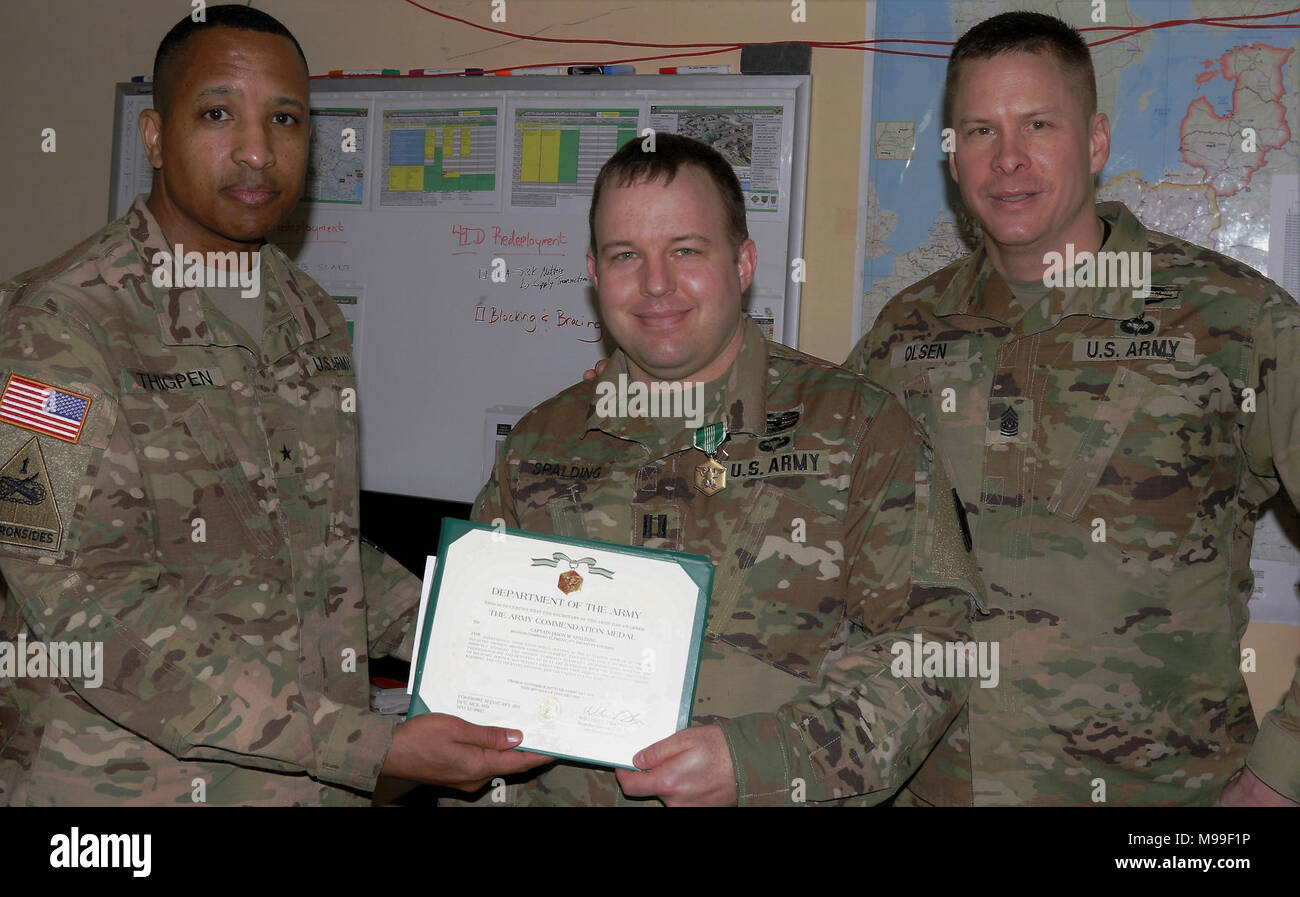 Capt. Jason M. Spalding (center), 21st Theater Sustainment Command ...