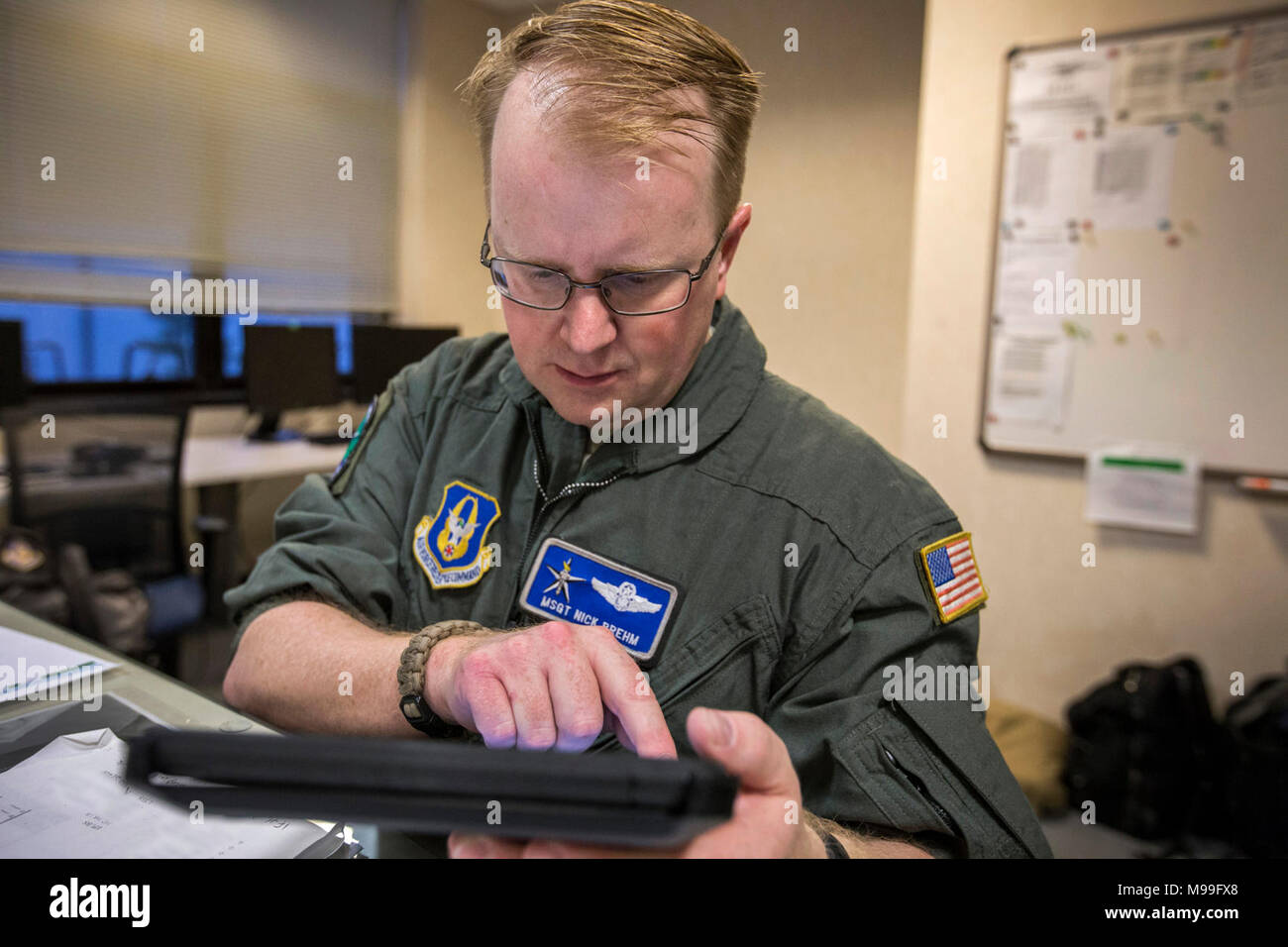 U.S. Air Force Master Sgt. Nicholas R. Brehm, a C-17 Globemaster III ...