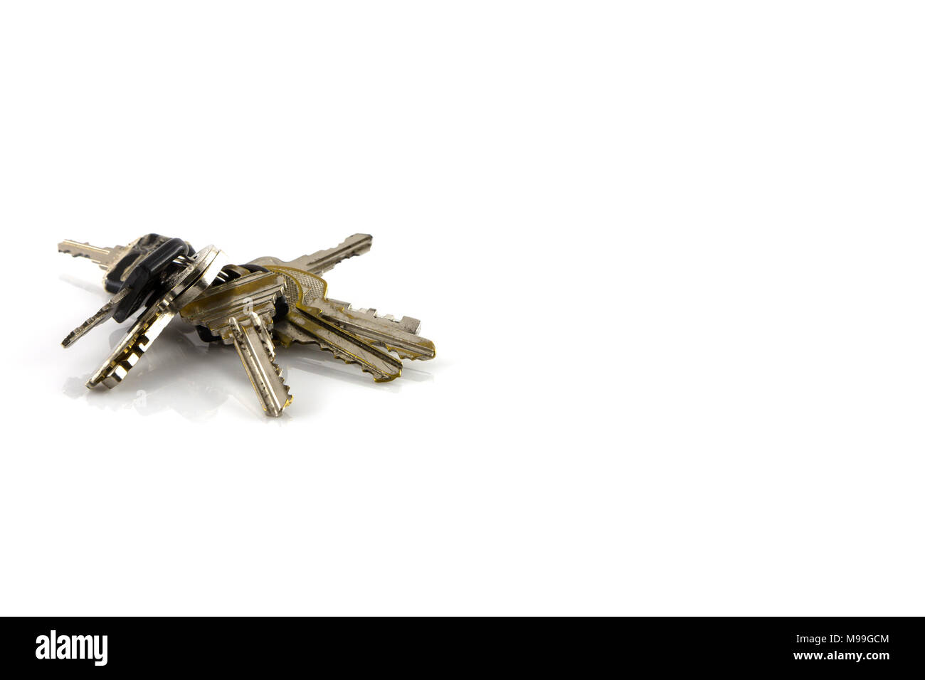 Large bunch of keys isolate on white background Stock Photo - Alamy