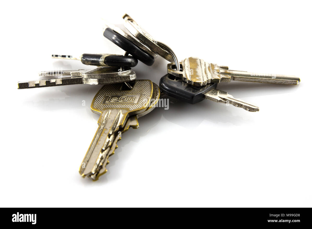 Large bunch of keys isolate on white background Stock Photo - Alamy