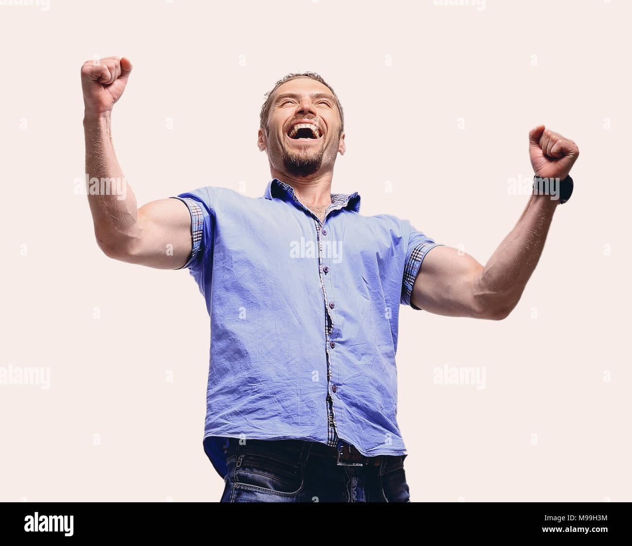 Full body portrait of relaxed mature man raising arms over white Stock ...