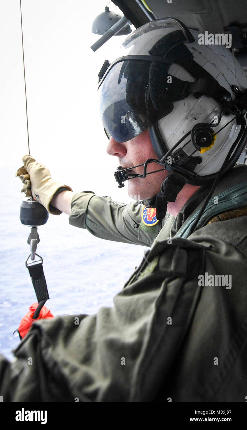 Naval Air Crewman (Helicopter) 2nd Class Jacob Ward, assigned to the ...