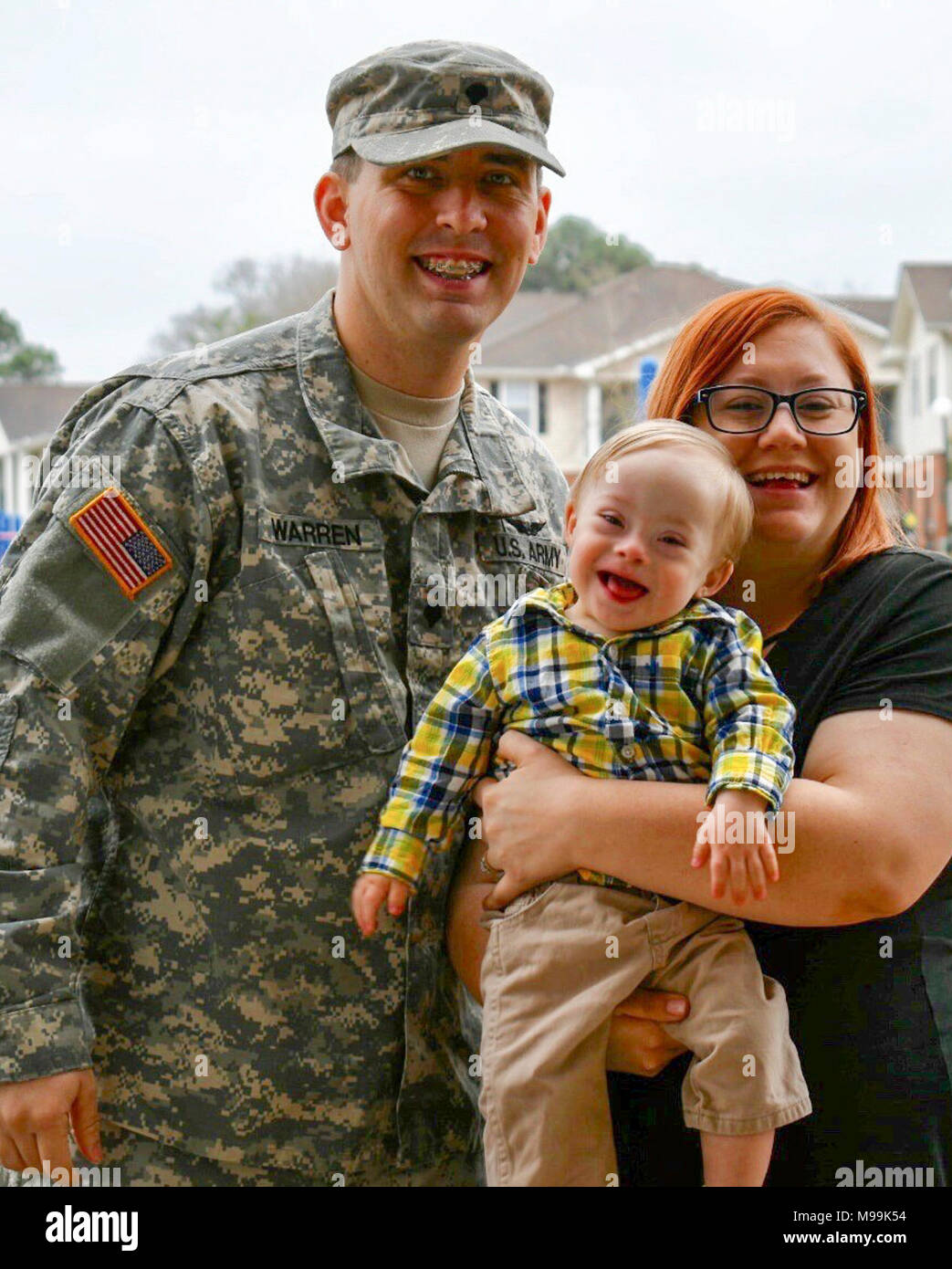 Georgia Guardsman Spc. Jason Warren smiles for a picture with his wife ...