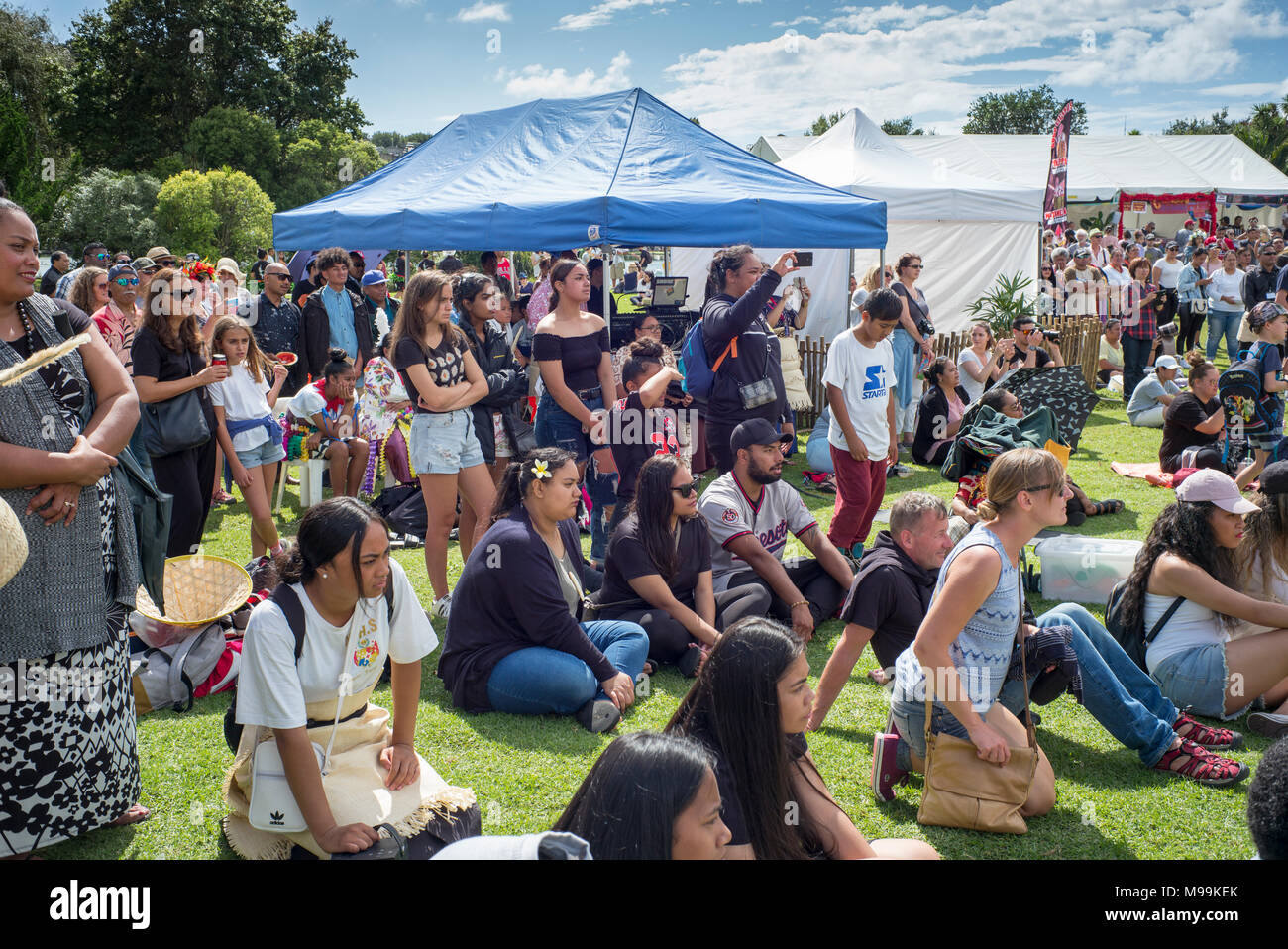 Spectators seated and standing as they watch dance performances at ...