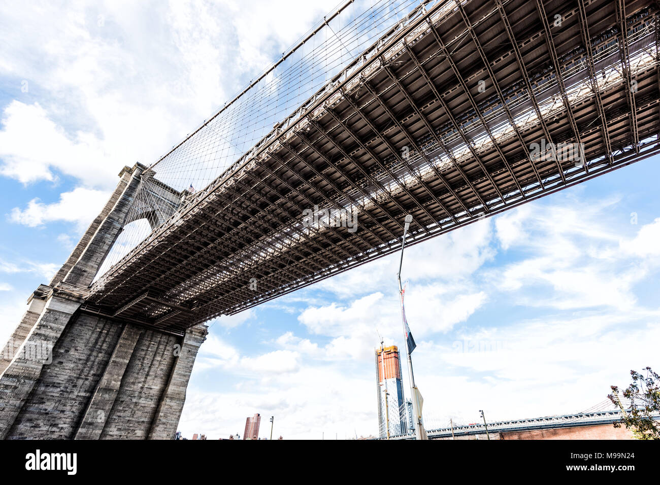 Closeup view of under Brooklyn Bridge outside exterior outdoors in NYC ...
