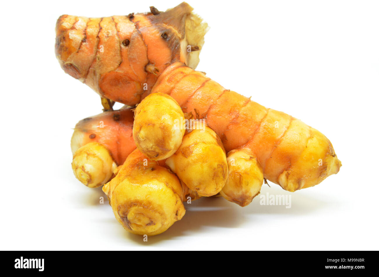 Fresh turmeric root isolated on white background Stock Photo - Alamy
