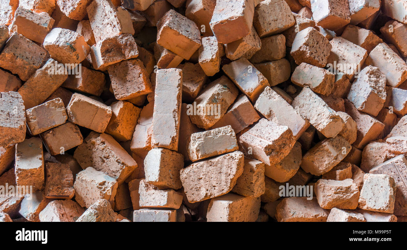 pile of clay bricks for construction materials Stock Photo - Alamy
