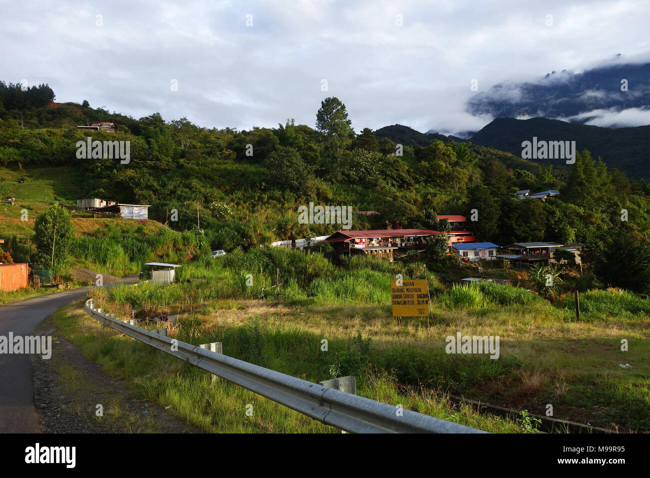 RANAU, MALAYSIA- 29 JUN, 2017: Beautiful sunrise over layer hill at ...