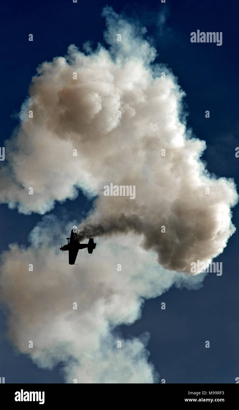 aerobatic aircraft display wreathed in smoke Stock Photo - Alamy
