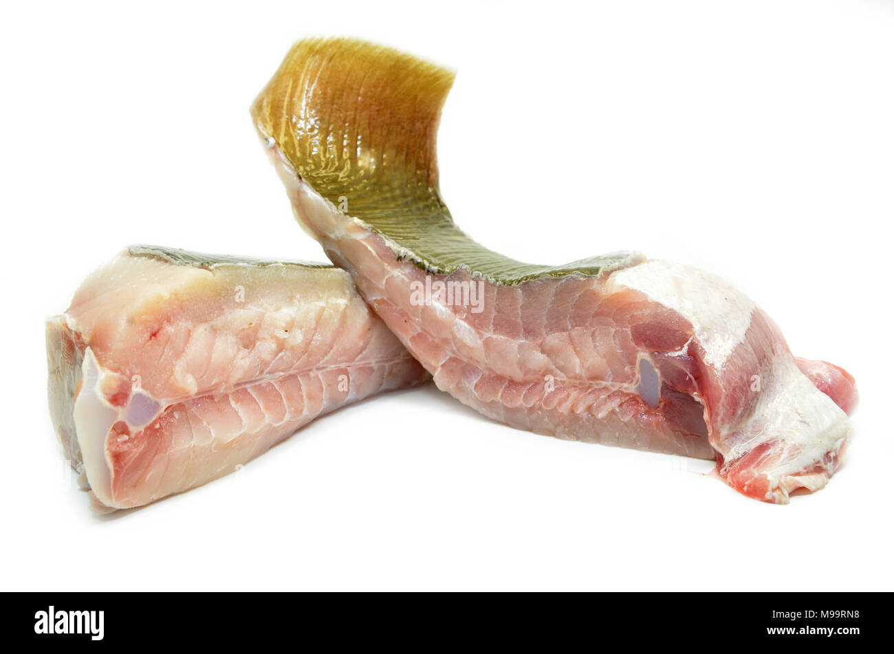 Raw stingray meat isolated on white background Stock Photo - Alamy