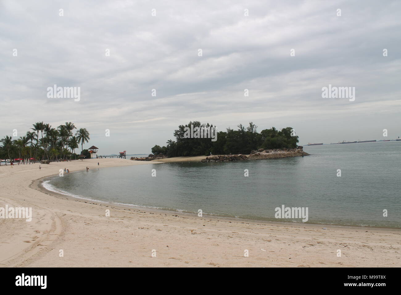 Sunny day on a beautiful beach on Sentosa Island Stock Photo - Alamy