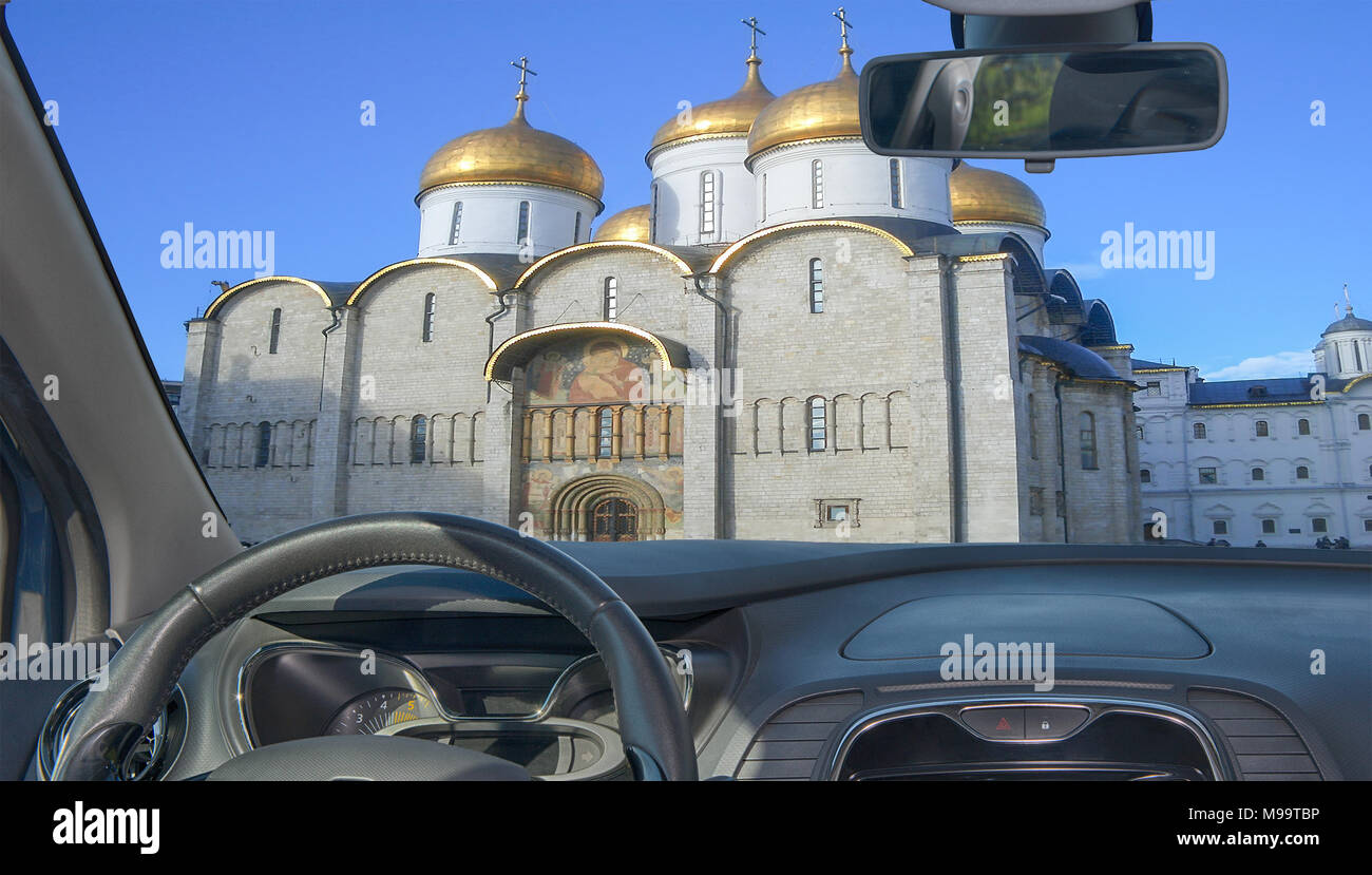 Looking through a car windshield with view of the Dormition Cathedral ...