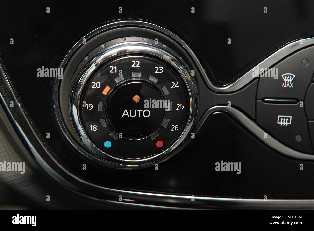 Interior of a car with closeup of air conditioning system control ...