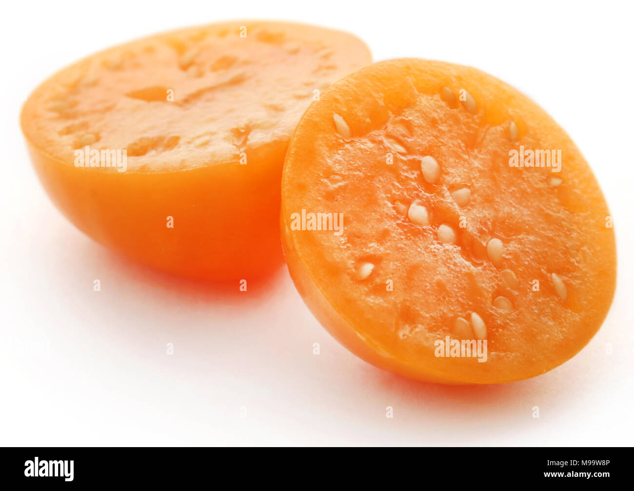 Fresh edible physalis over white background Stock Photo - Alamy