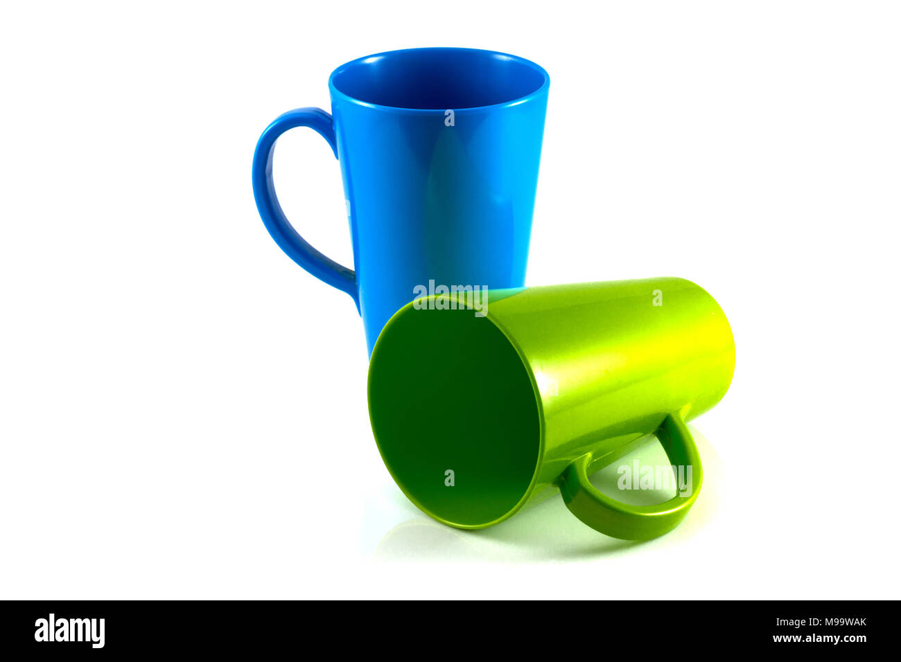 Green and blue cup isolate on white background Stock Photo - Alamy