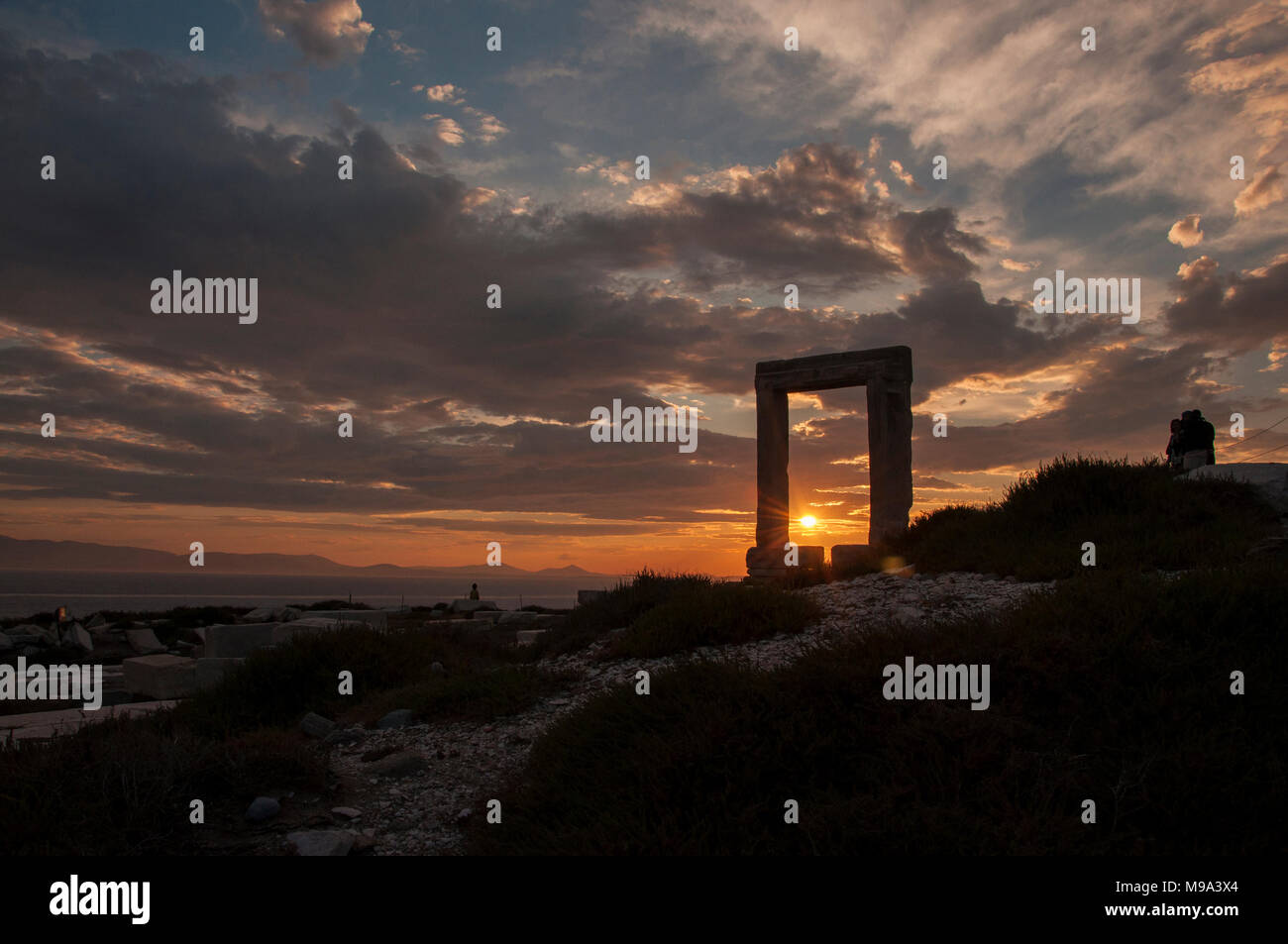 Portara monument at sunset time Stock Photo - Alamy