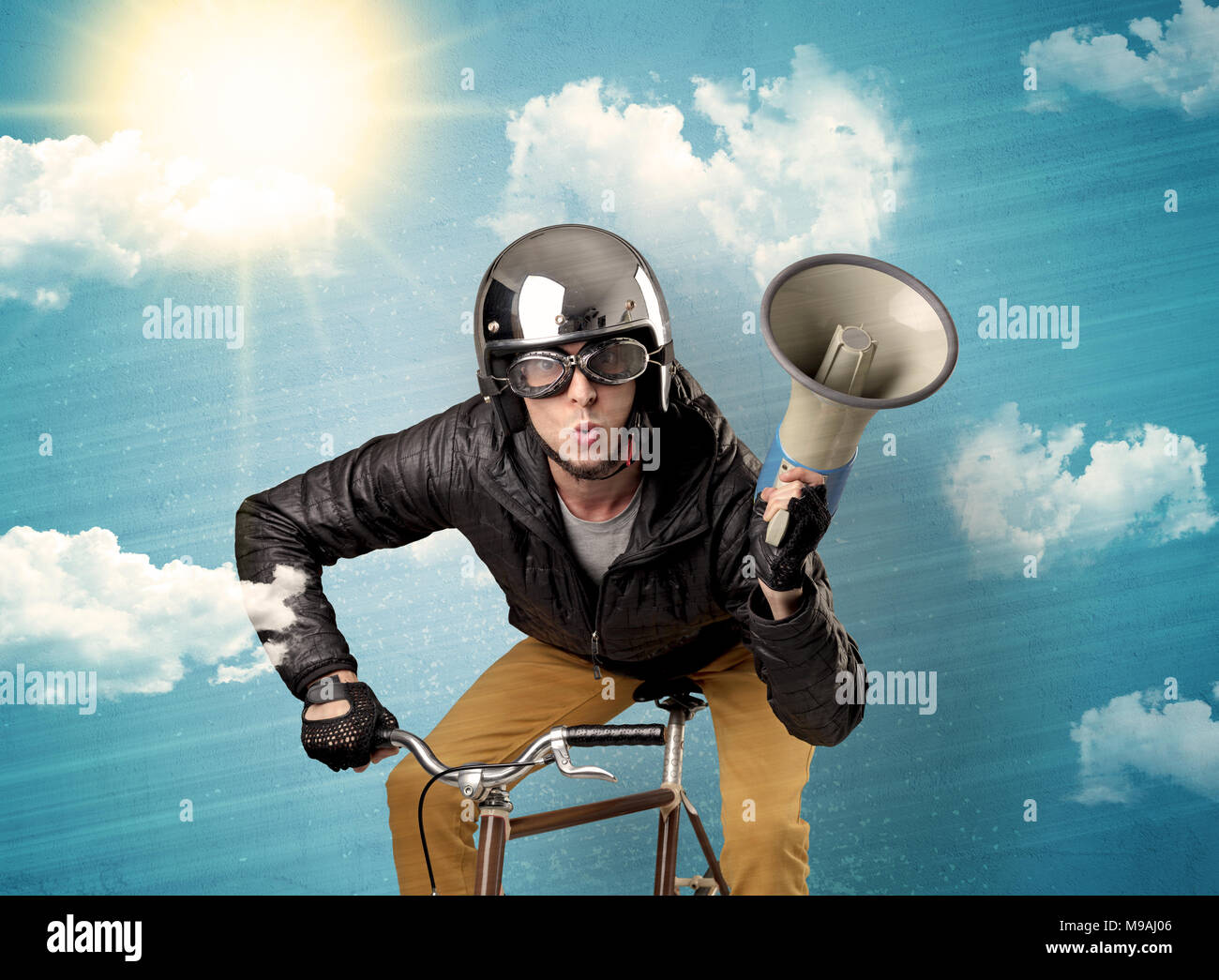 Nerd, crazy stylish rider on the bicycle with sunny weather Stock Photo ...