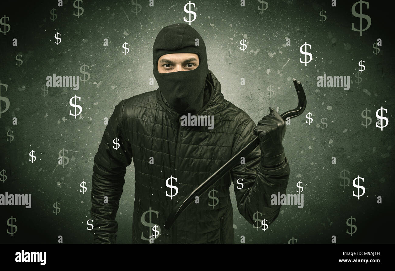 Money hungry thief in black clothes and tolls on his hand Stock Photo ...
