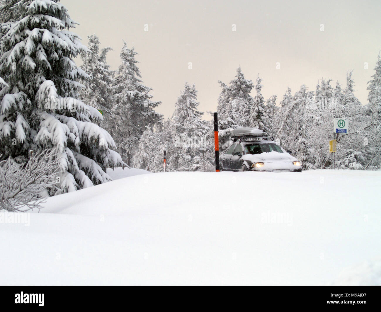 winter landscape with driving car Stock Photo - Alamy