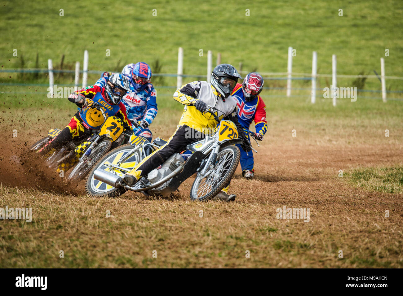 Grass track motorcycle racing action Stock Photo - Alamy