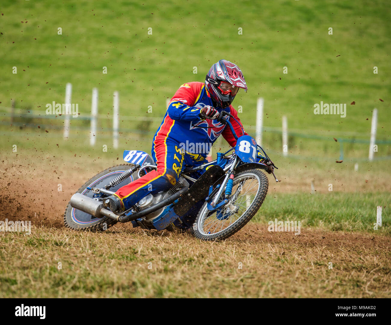 Grass track motorcycle racing action Stock Photo - Alamy