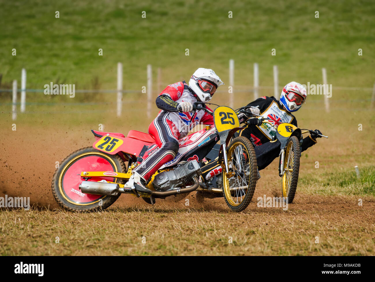 Grass track motorcycle racing action Stock Photo - Alamy