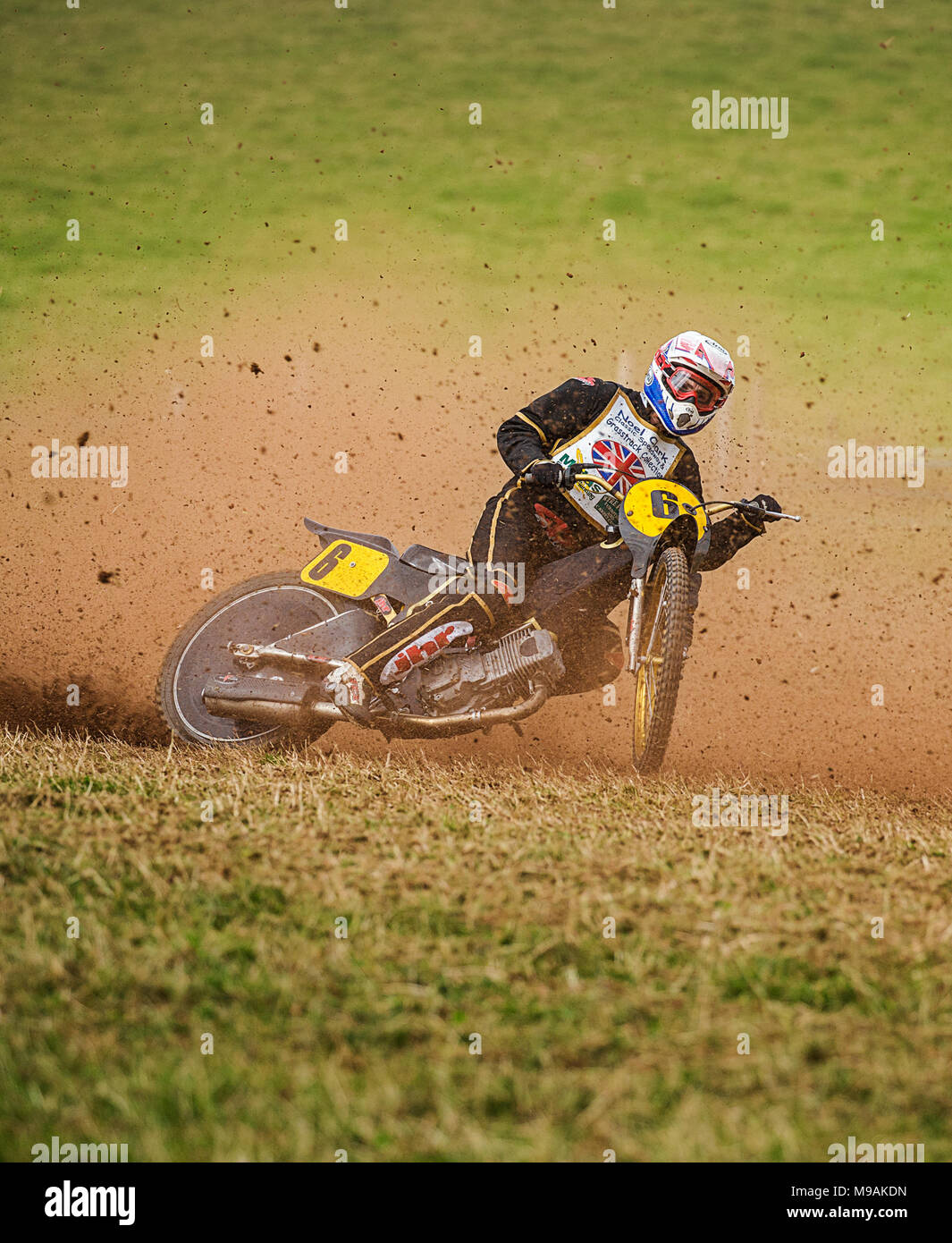 Grass track motorcycle racing action Stock Photo - Alamy