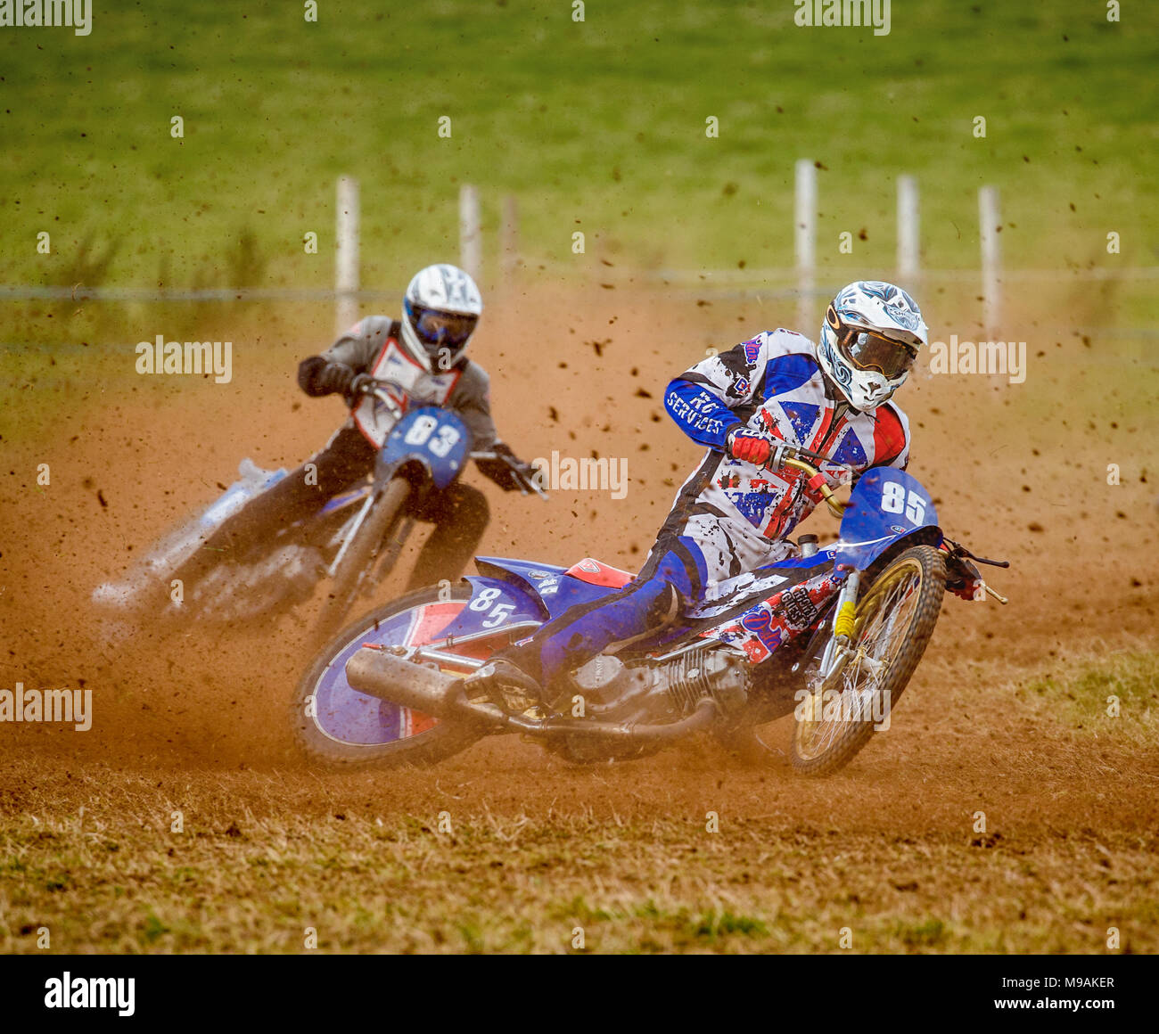 Grass track motorcycle racing action Stock Photo - Alamy